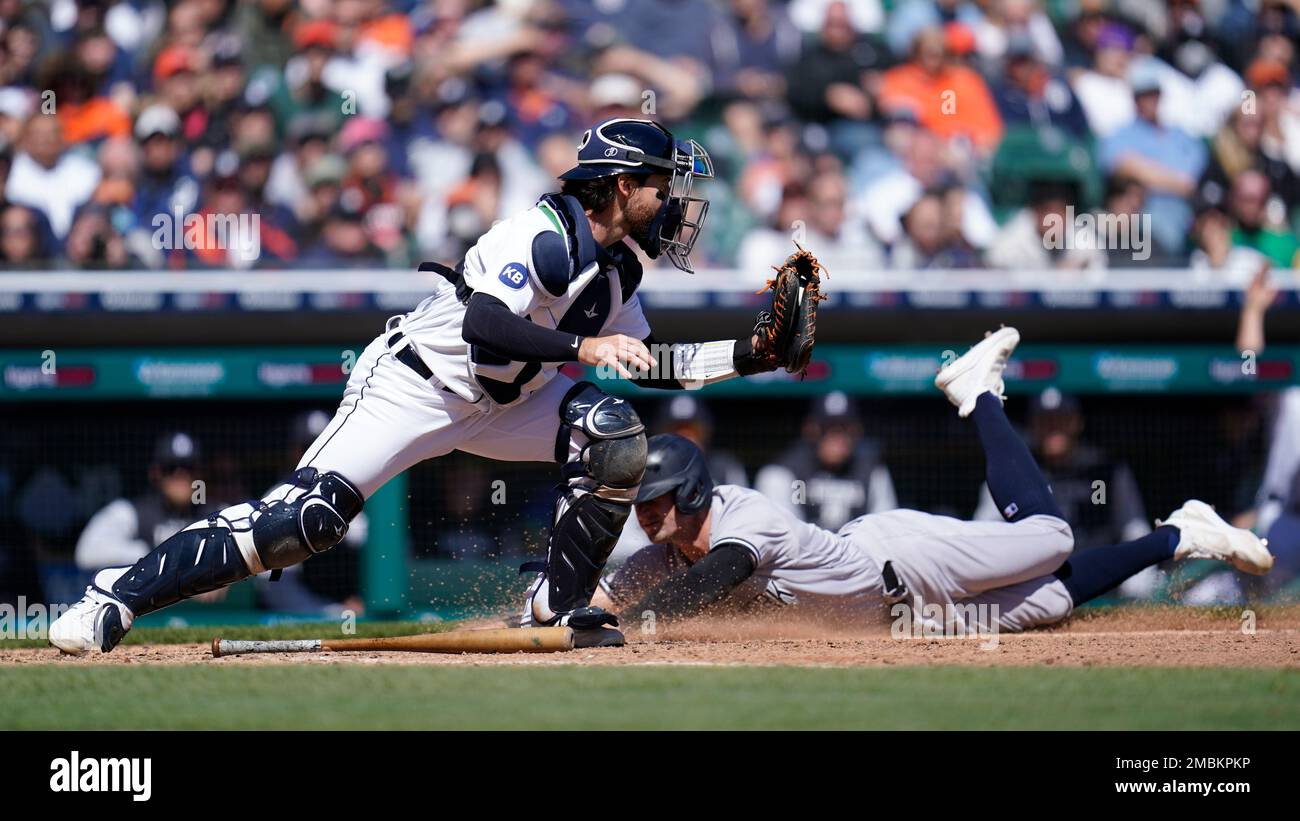 Detroit Tigers catcher Eric Haase steps on home plate for a force out ...