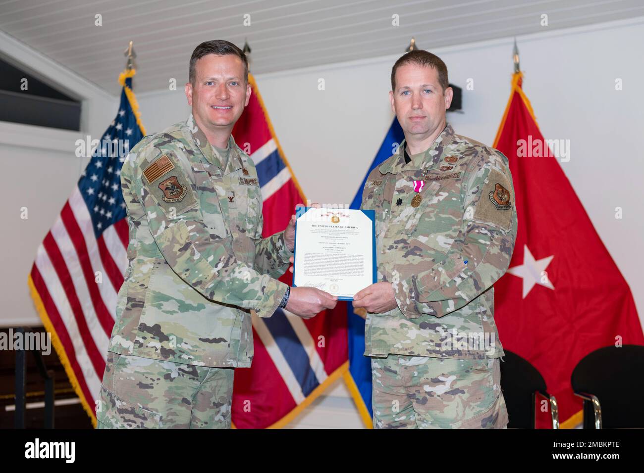 U.S. Air Force Lt. Col. Charles Rice, right, 426th Air Base Squadron outgoing commander ...