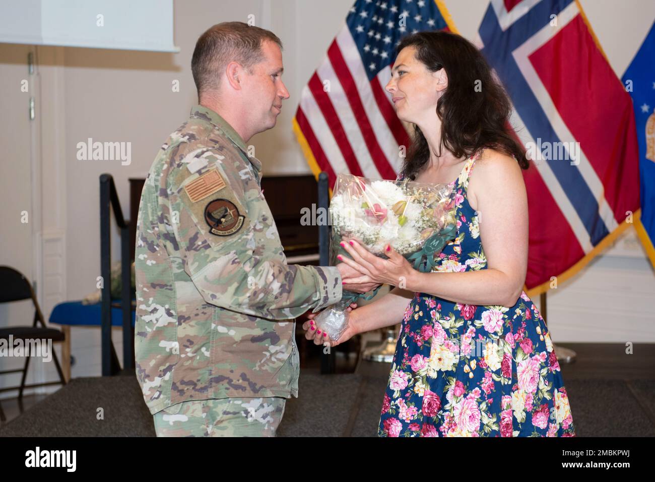 U.S. Air Force Lt. Col. Charles Rice, left, 426th Air Base Squadron outgoing commander, presents ...