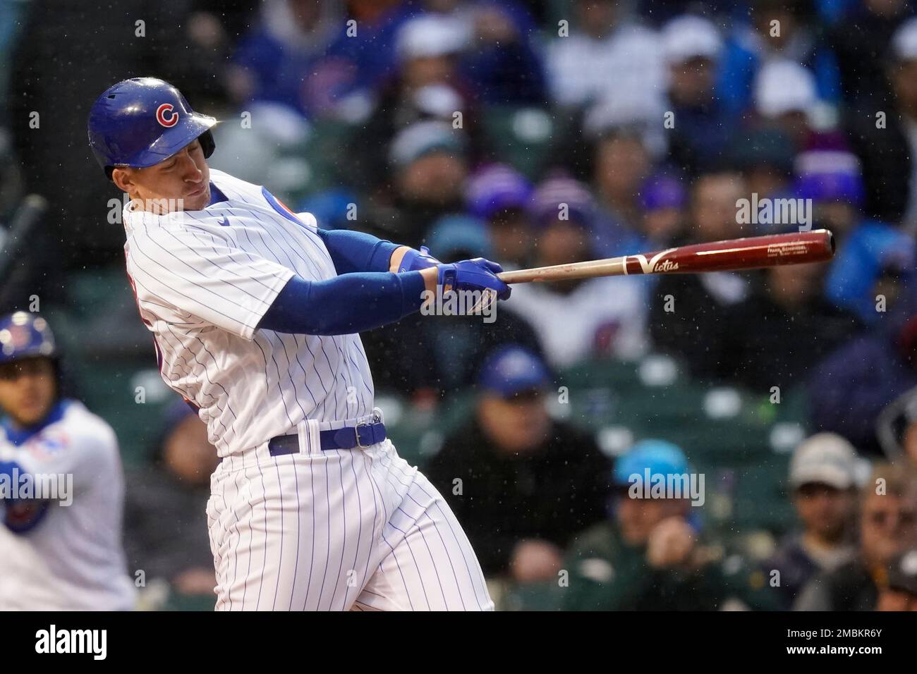 Chicago Cubs' Frank Schwindel swings at a pitch during a baseball game ...