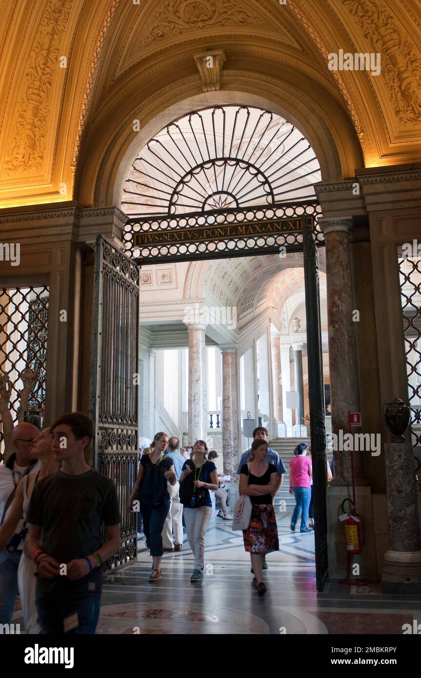 Visitors admire the artwork at the Vatican Museum Stock Photo - Alamy