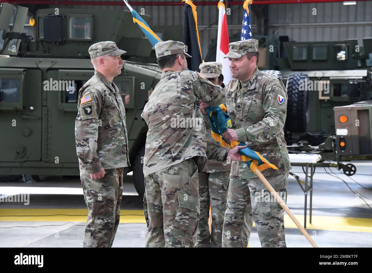 Outgoing AFSBn-Benelux Commander Lt. Col. Aaron Jones , passes the Army ...