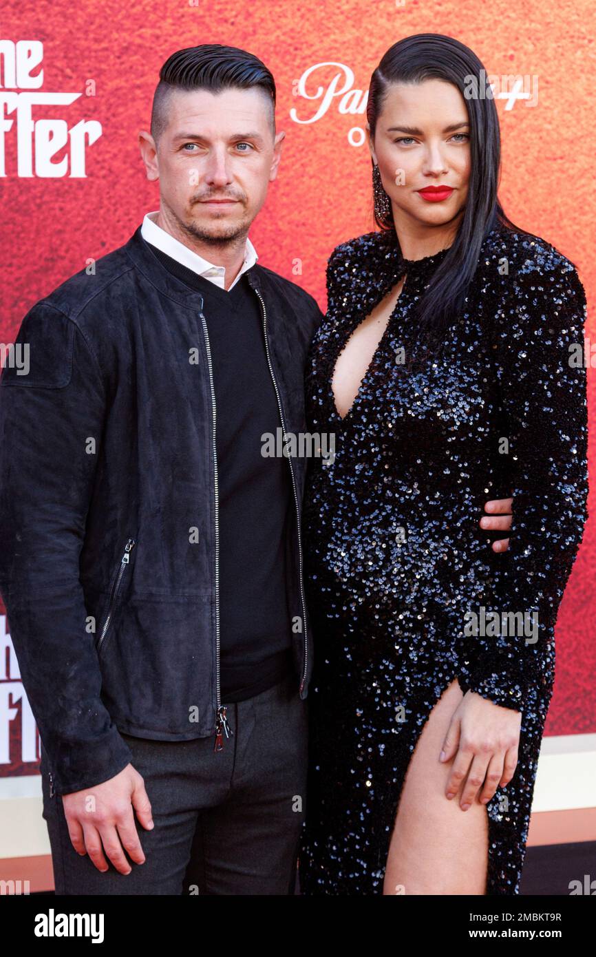 Andre Lemmers, left and expecting mother Adriana Lima arrive at the ...