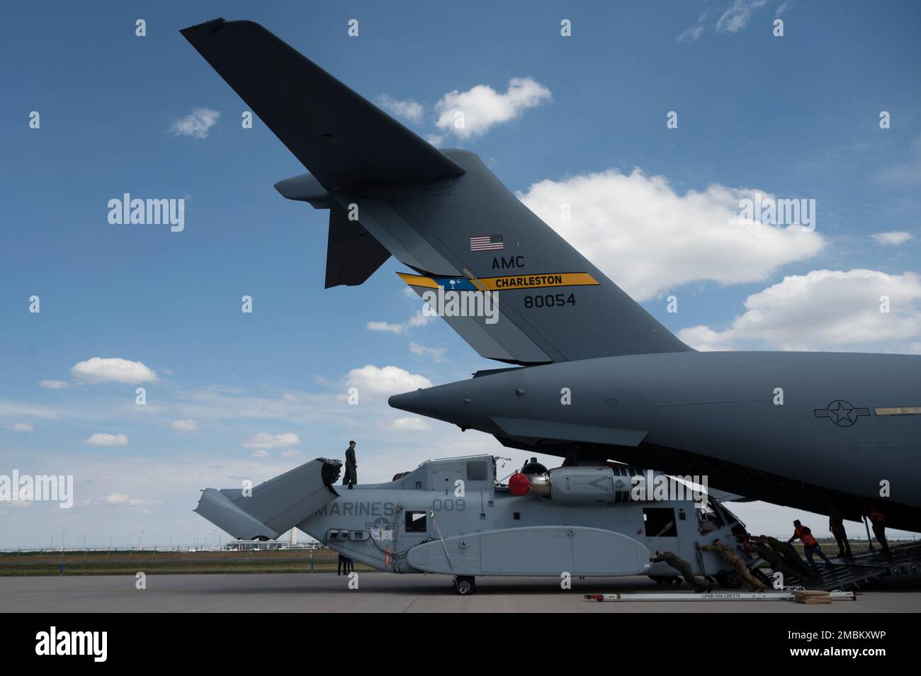U.S. Air Force aircrew from the 16th Airlift Squadron and U.S. Marines ...