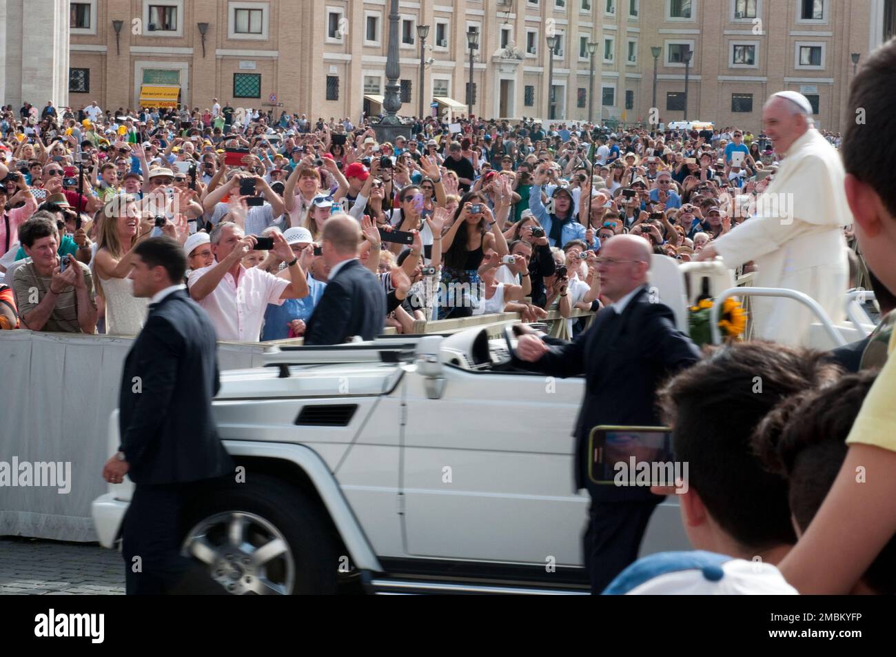 Pope Francis greets visitors to his weekly audience in St. Peter's ...