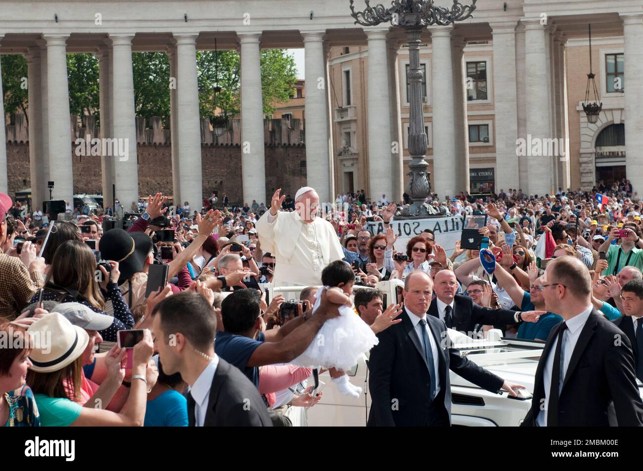 Pope Francis greets visitors to his weekly audience in St. Peter's ...
