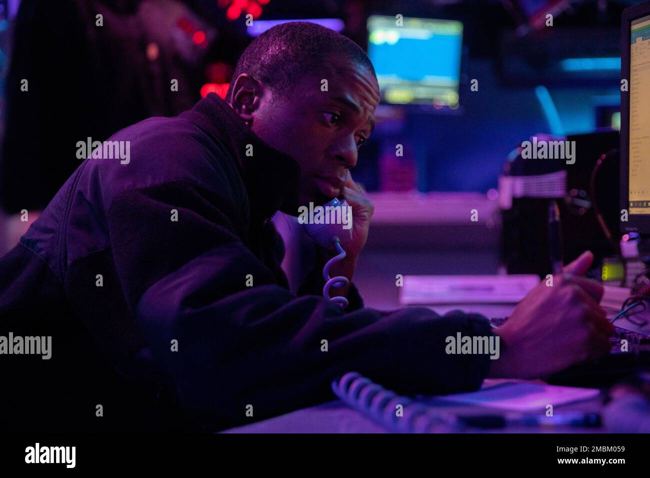 PHILIPPINE SEA (June 16, 2022) Lt. Donald Bowers, from Houston, talks ...