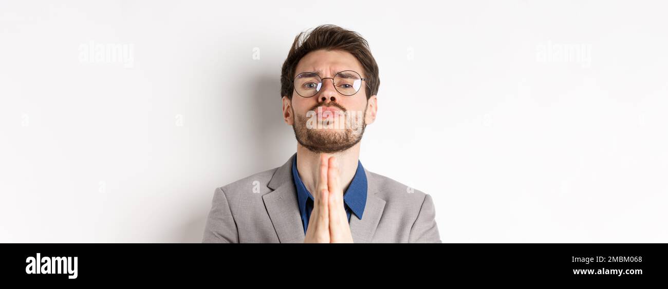 Clingy guy in glasses asking for last favour, begging for help and ...