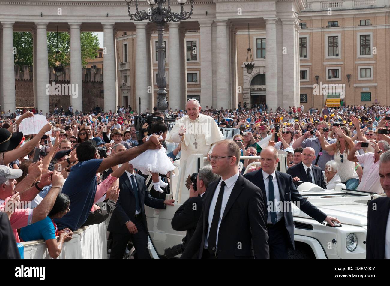 Pope Francis greets visitors to his weekly audience in St. Peter's ...
