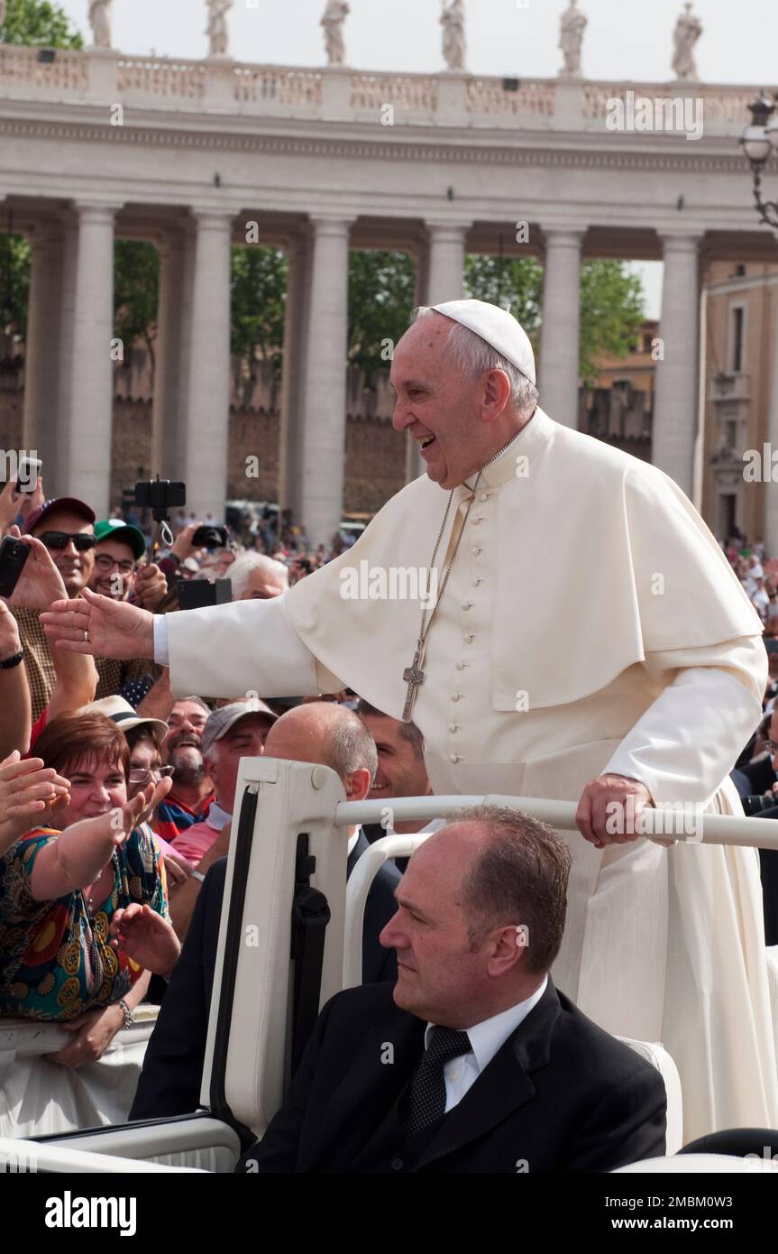 Pope Francis greets visitors to his weekly audience in St. Peter's ...