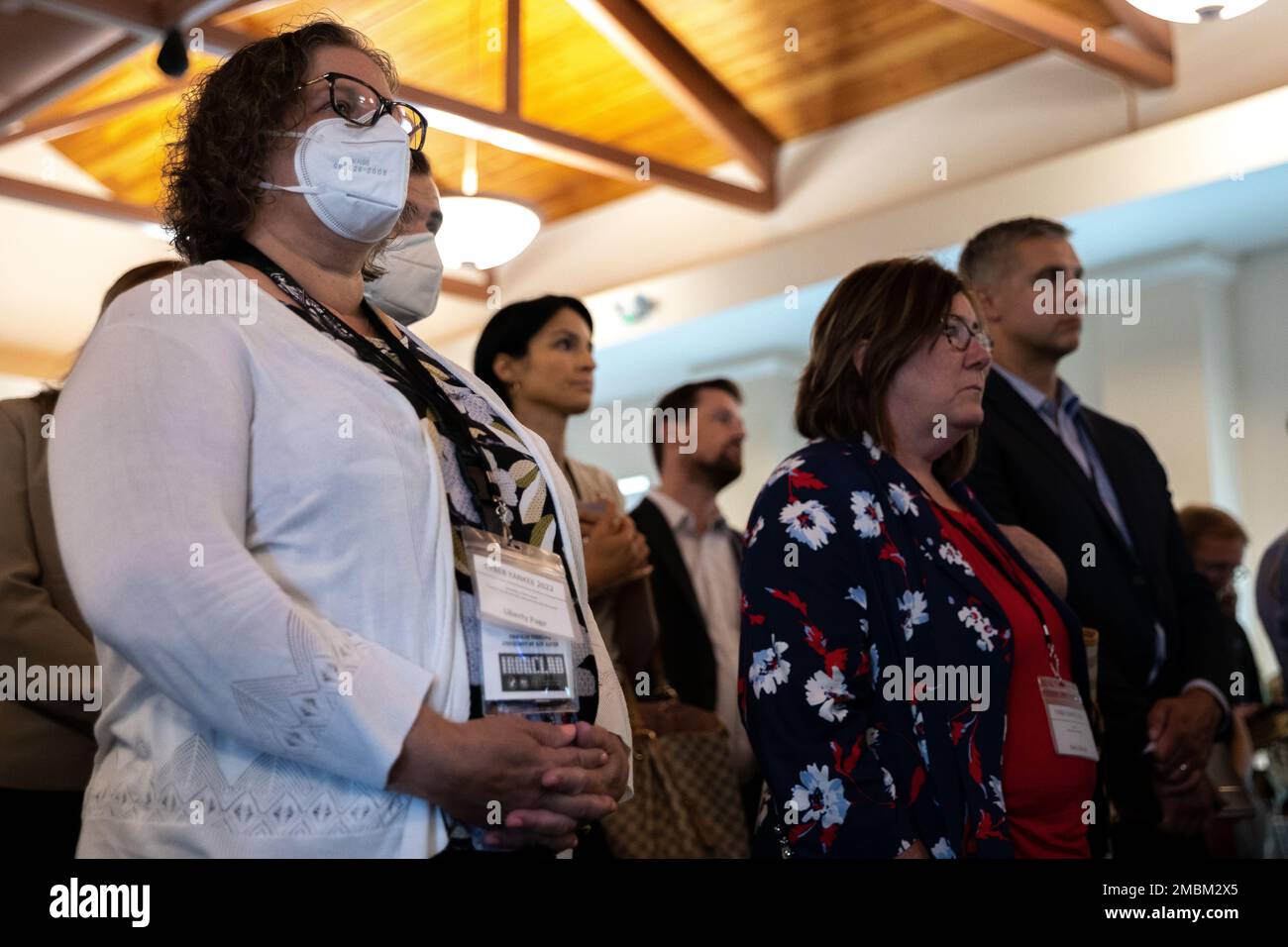 Liberty Page, a distinguished visitor attending Cyber Yankee, listens ...