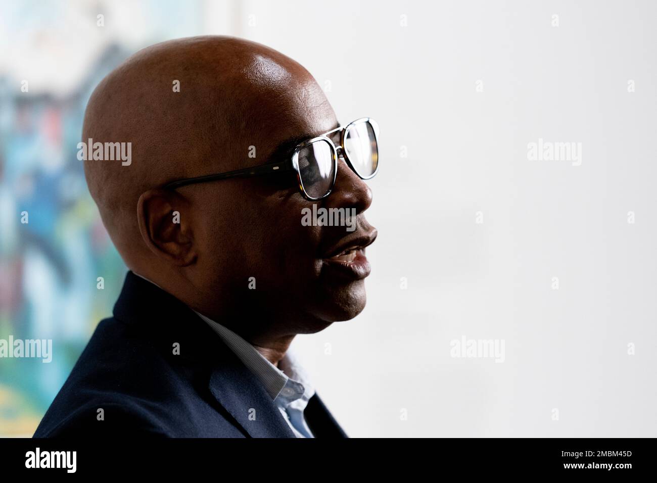 Artist Glenn Ligon speaks in front of his "I Am A Man" piece on opening ...