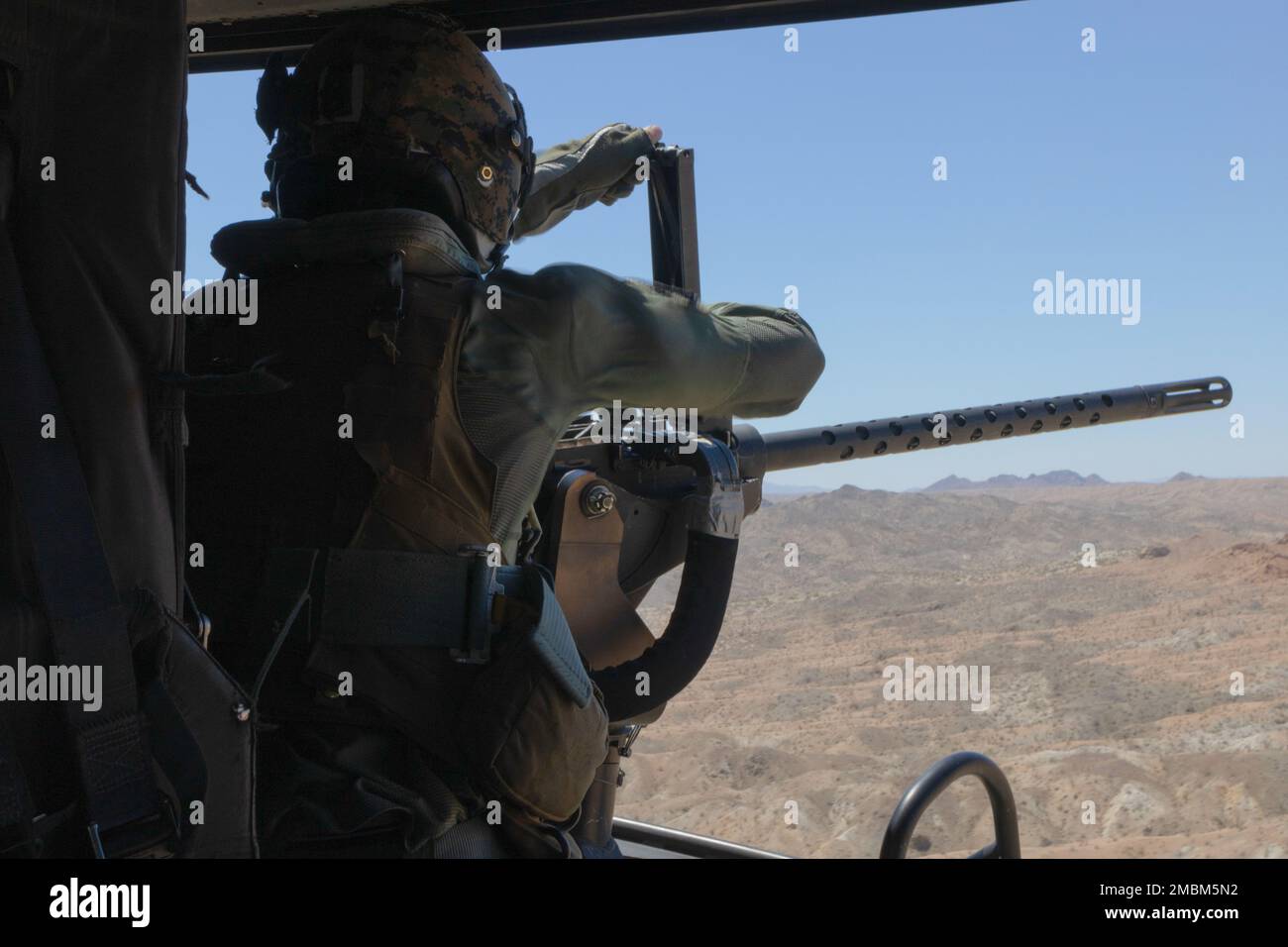 U.S. Marine Cpl. Robert Sponable, a crew chief with Marine Light Attack ...