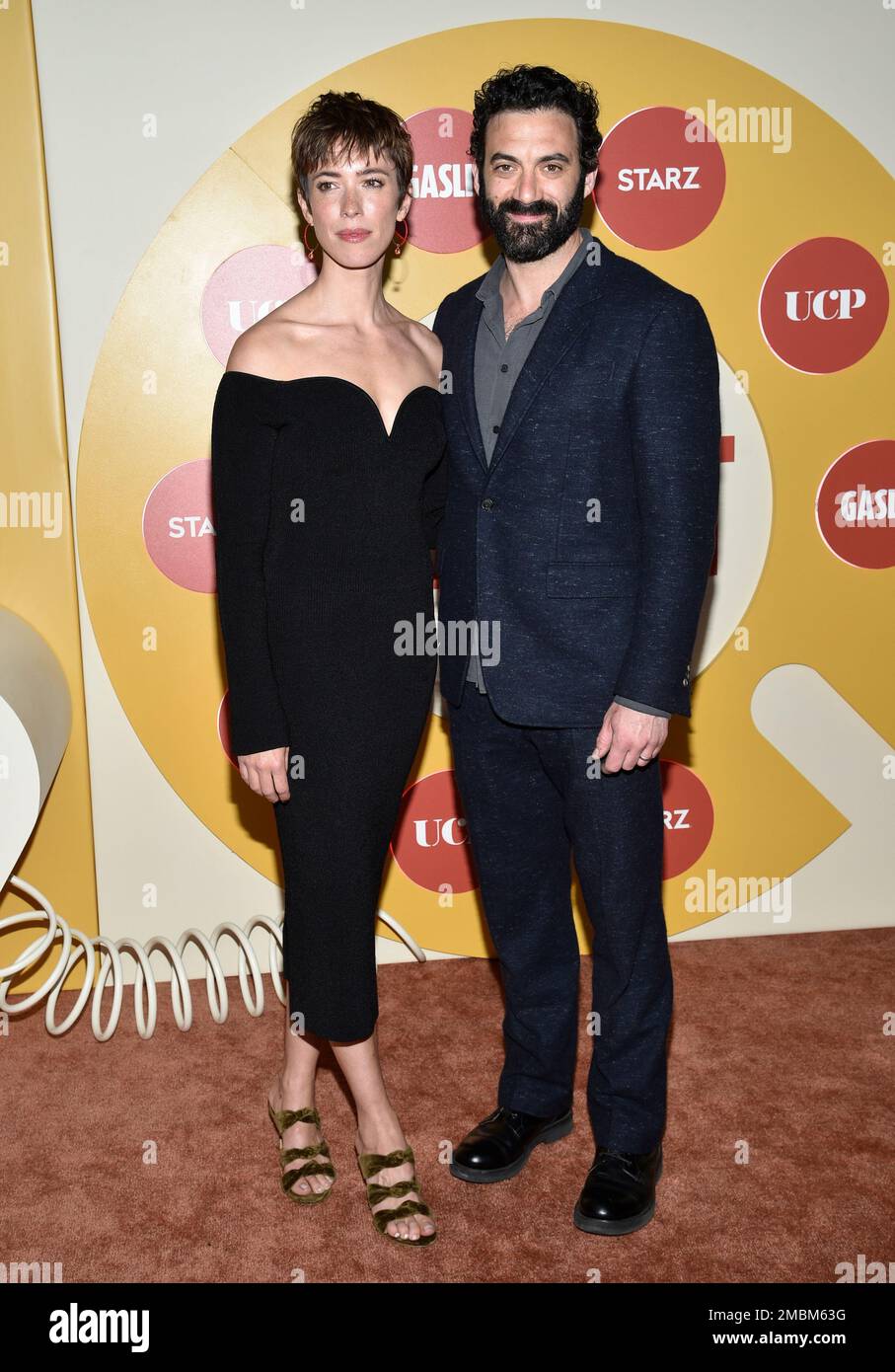 Actors Rebecca Hall, left, and husband Morgan Spector attend the ...
