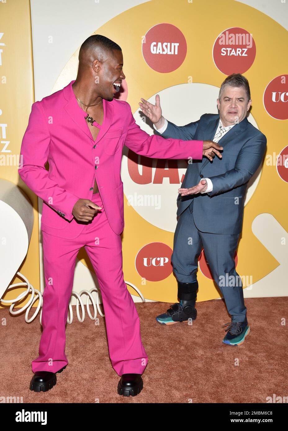 Actors Patrick Walker, left, and Patton Oswalt attend the premiere for ...