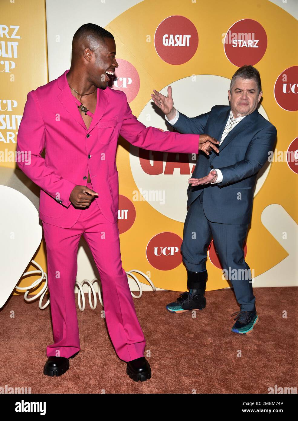 Actors Patrick Walker, left, and Patton Oswalt attend the premiere for ...