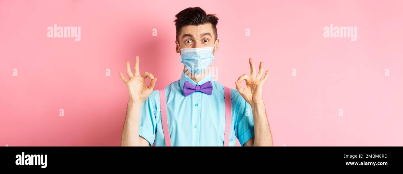 Coronavirus, healthcare and quarantine concept. Happy guy in medical ...