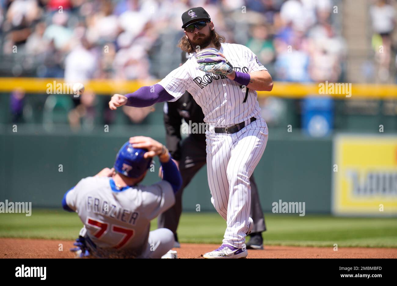 Colorado Rockies second baseman Brendan Rodgers, back, forces out ...