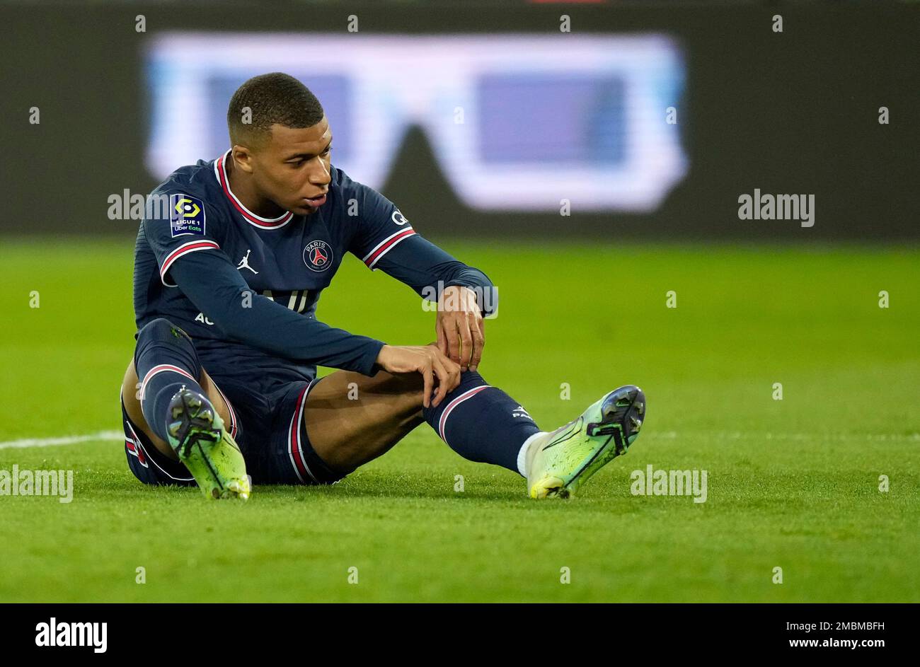 PSG's Kylian Mbappe reacts after sustaining an injury during the League ...