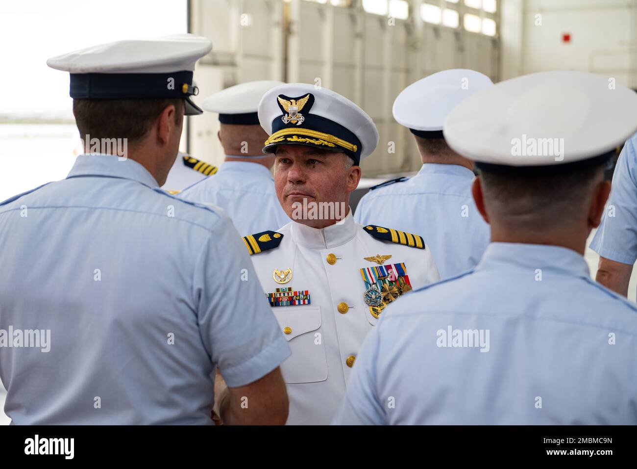 U.S. Coast Guard Capt. Thomas Cooper and Capt. Christopher Huberty ...