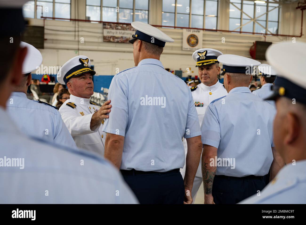 U.S. Coast Guard Capt. Thomas Cooper and Capt. Christopher Huberty ...