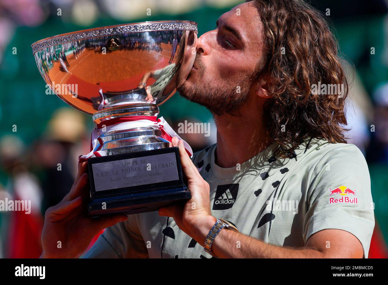 Greece's Stefanos Tsitsipas kisses his trophy after winning the final ...
