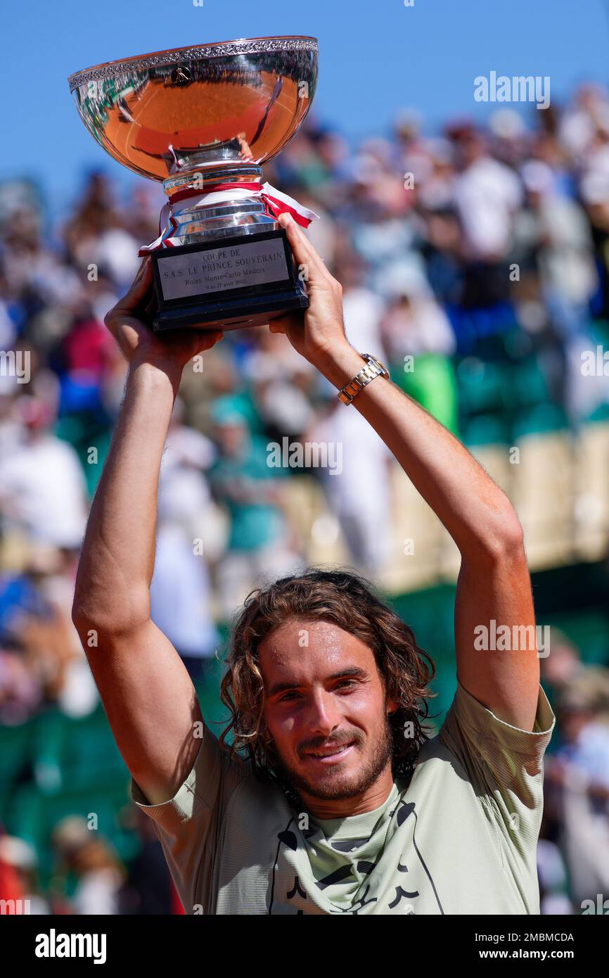 Greece's Stefanos Tsitsipas holds up his trophy after winning the final match of the Monte-Carlo ...