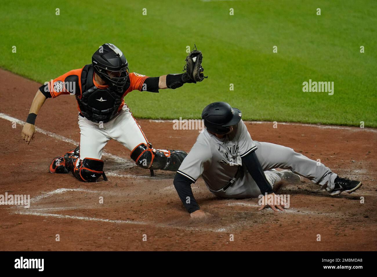 Baltimore Orioles catcher Anthony Bemboom, left, tags out New York ...