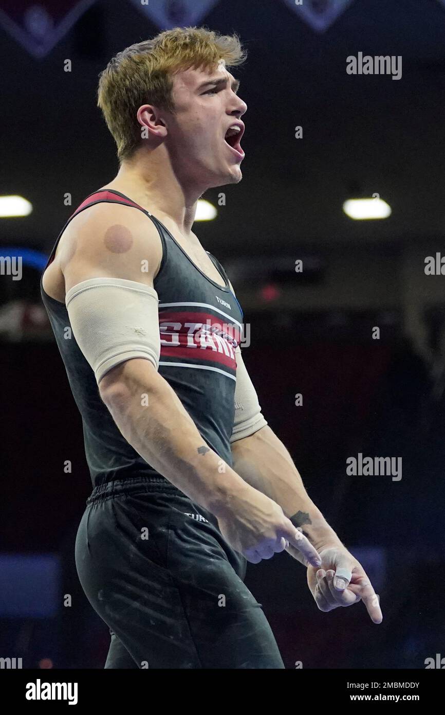 Stanford's Curran Phillips reacts after competing on the still rings ...