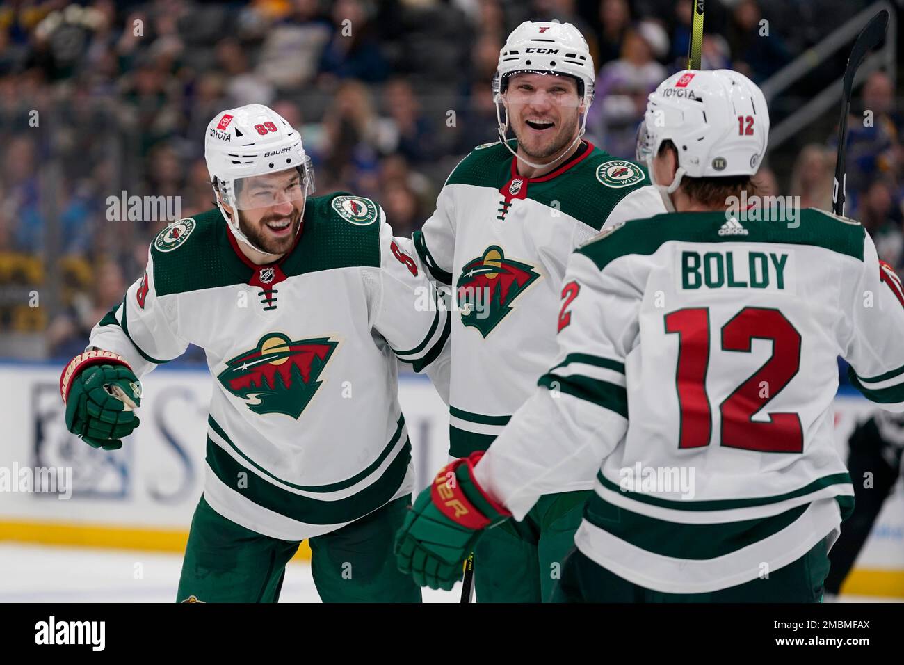 Minnesota Wild's Frederick Gaudreau (89) is congratulated by Dmitry ...
