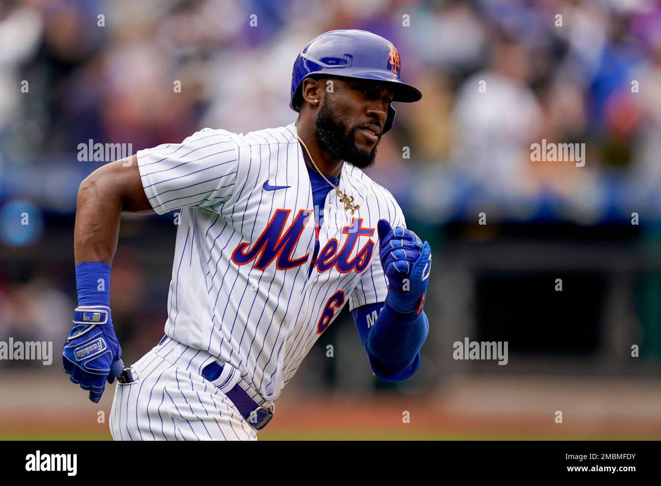New York Mets' Starling Marte runs the bases after hitting a two-run ...