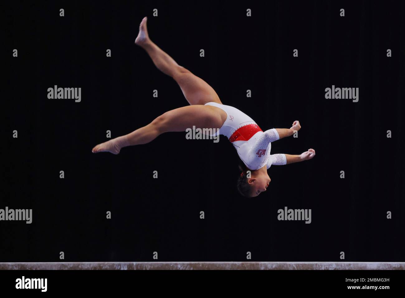 Utah's Cristal Isa competes on the balance beam during the NCAA college ...