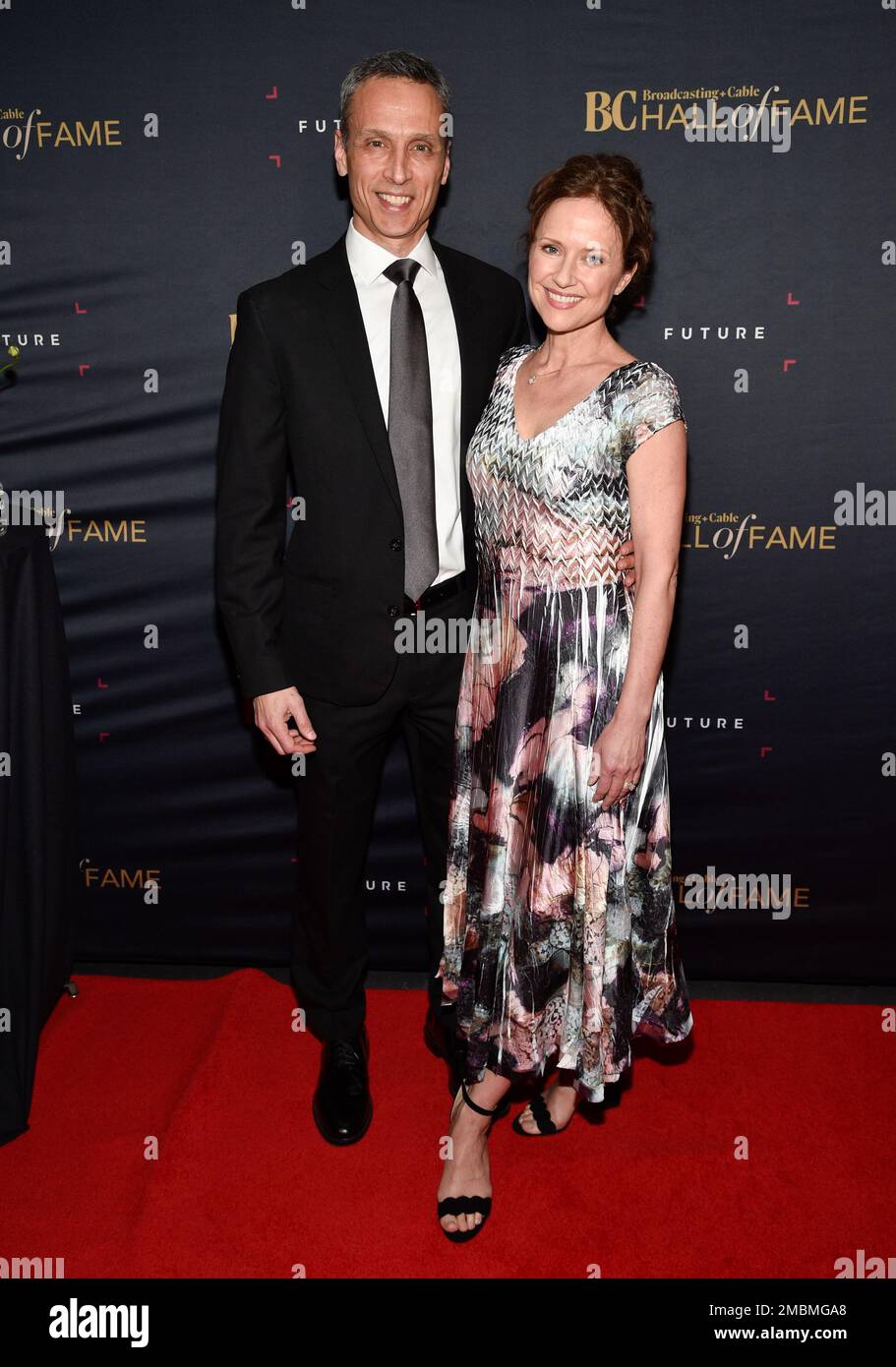 ESPN chairman Jimmy Pitaro, left, and wife Jean Louisa Kelly attend the ...