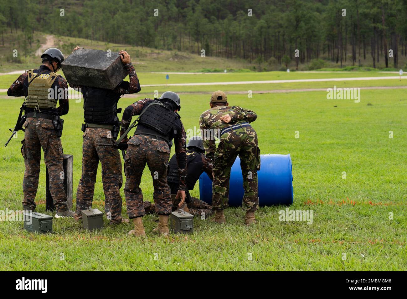 LA VENTA, Honduras - Members of the Armed Forces of Honduras shoots ...