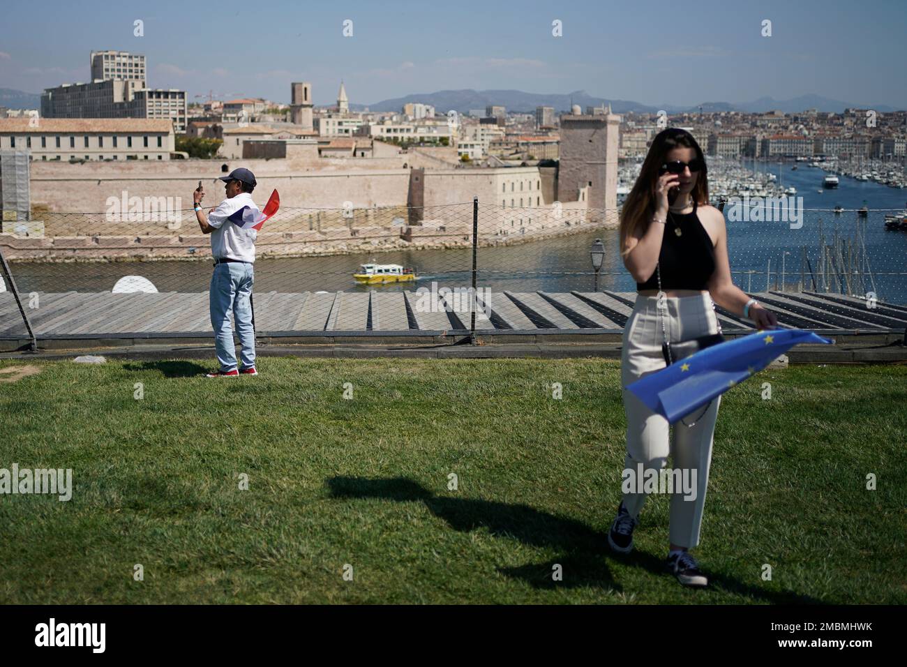 Supporters of French President and centrist candidate Emmanuel Macron ...