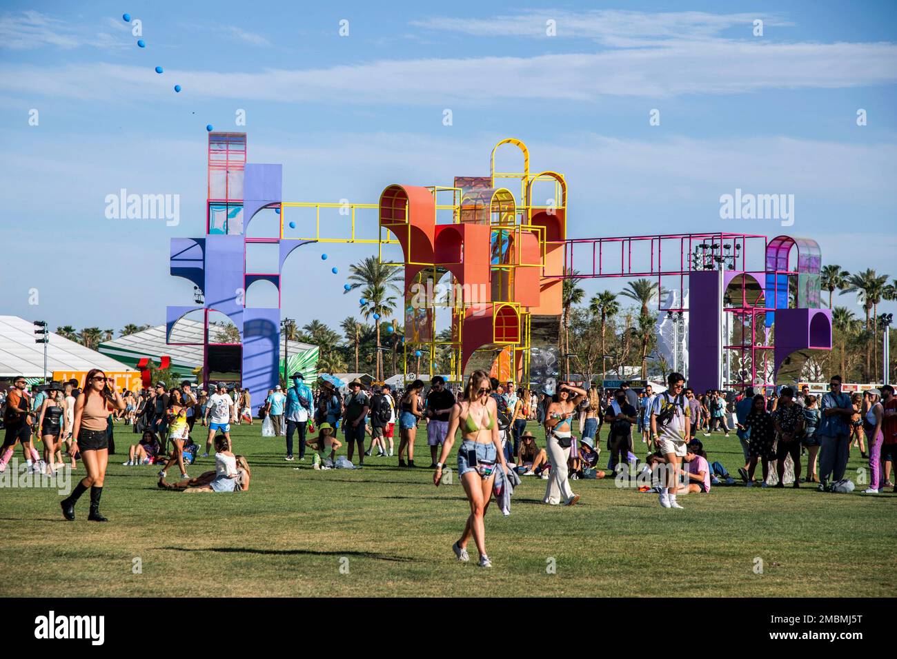 Festivalgoers walk on the grounds at the Coachella Music & Arts ...