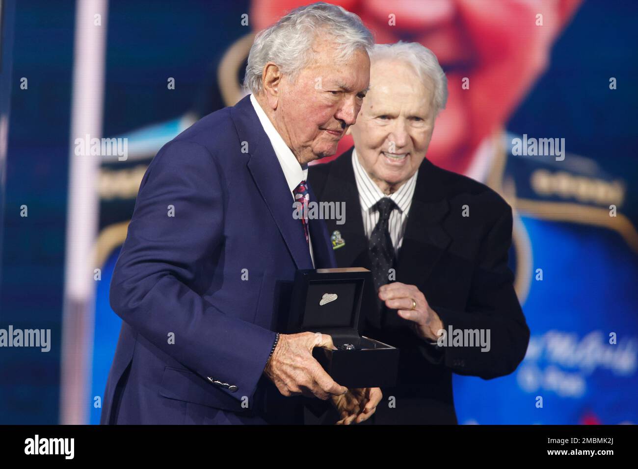 Hershel McGriff, left, accepts his ring during his NASCAR Hall of Fame ...