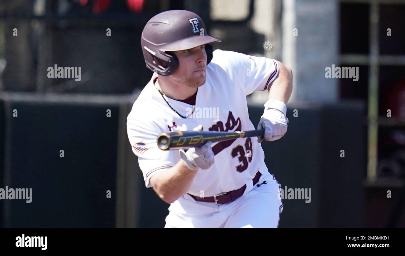 Fordham outfielder Ryan Thiese (39) squares to bunt during an NCAA ...