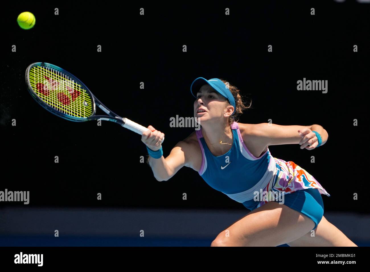 Belinda Bencic of Switzerland plays a forehand return to Camila Giorgi ...