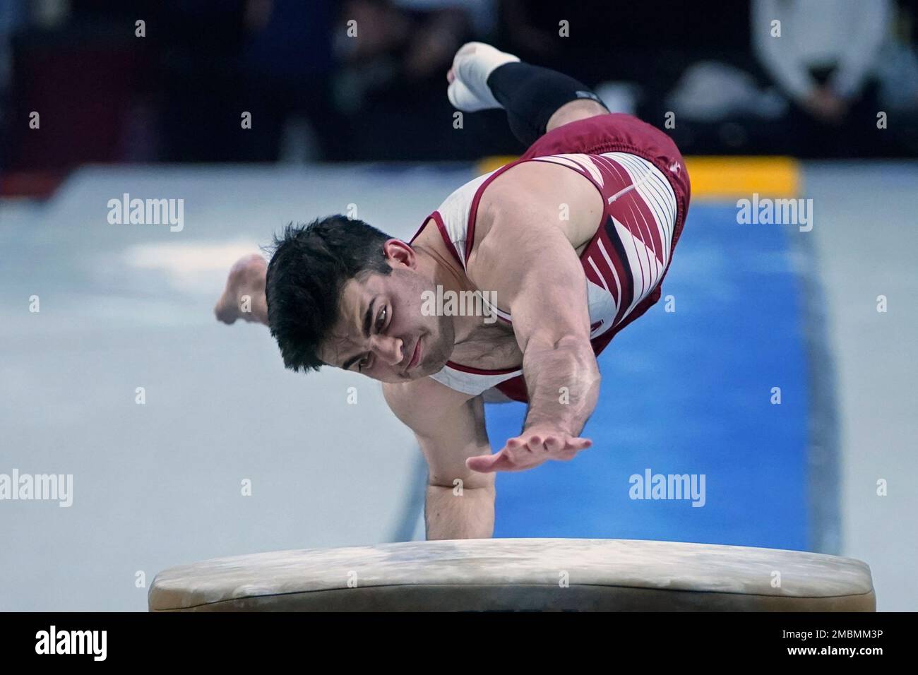 Stanford's Bryan Perla competes on the vault during a first-day ...