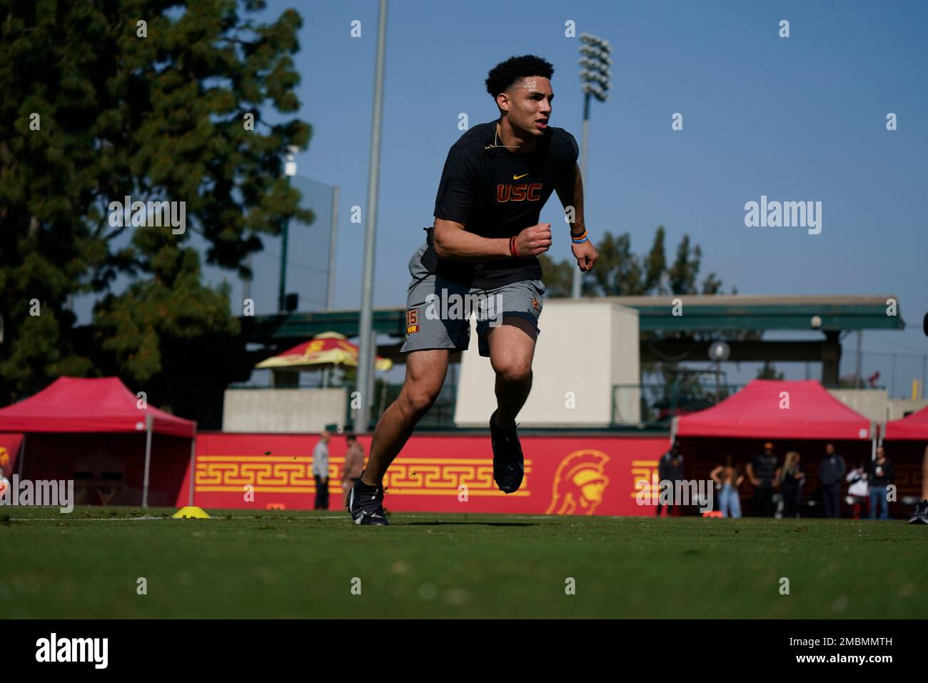 Wide receiver Drake London runs a football drill during Southern ...