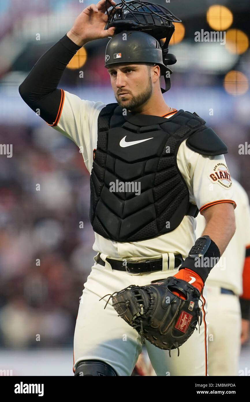 San Francisco Giants' Joey Bart wears a PitchCom device against the San ...