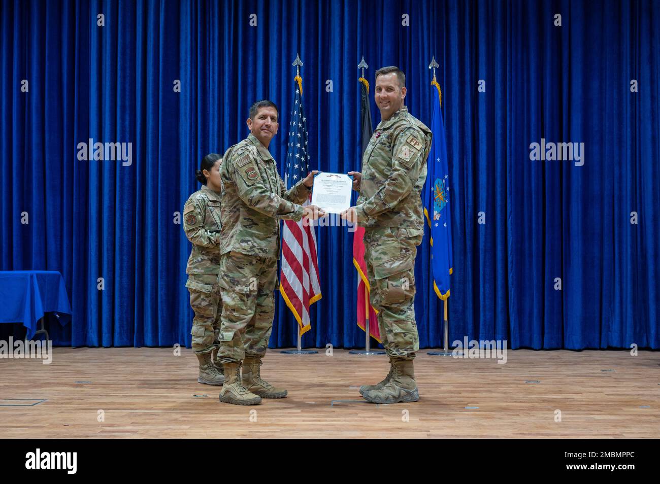 U.S. Air Force Col. John Gustafson, left, commander, 386th ...