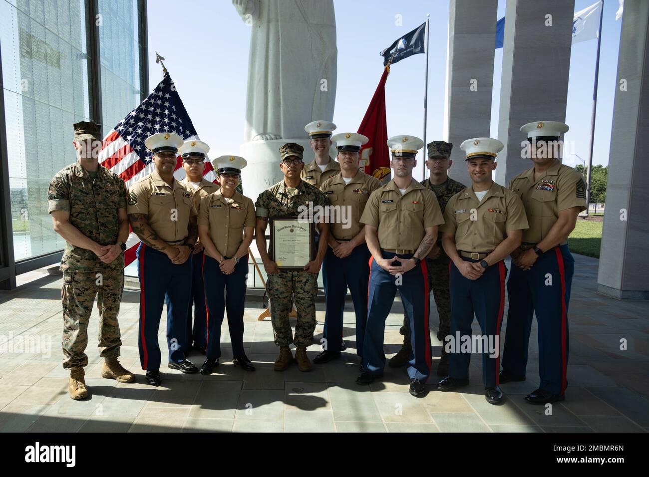 U.S. Marines with Recruiting Station Richmond, 4th Marine Corps District, gather for a group ...
