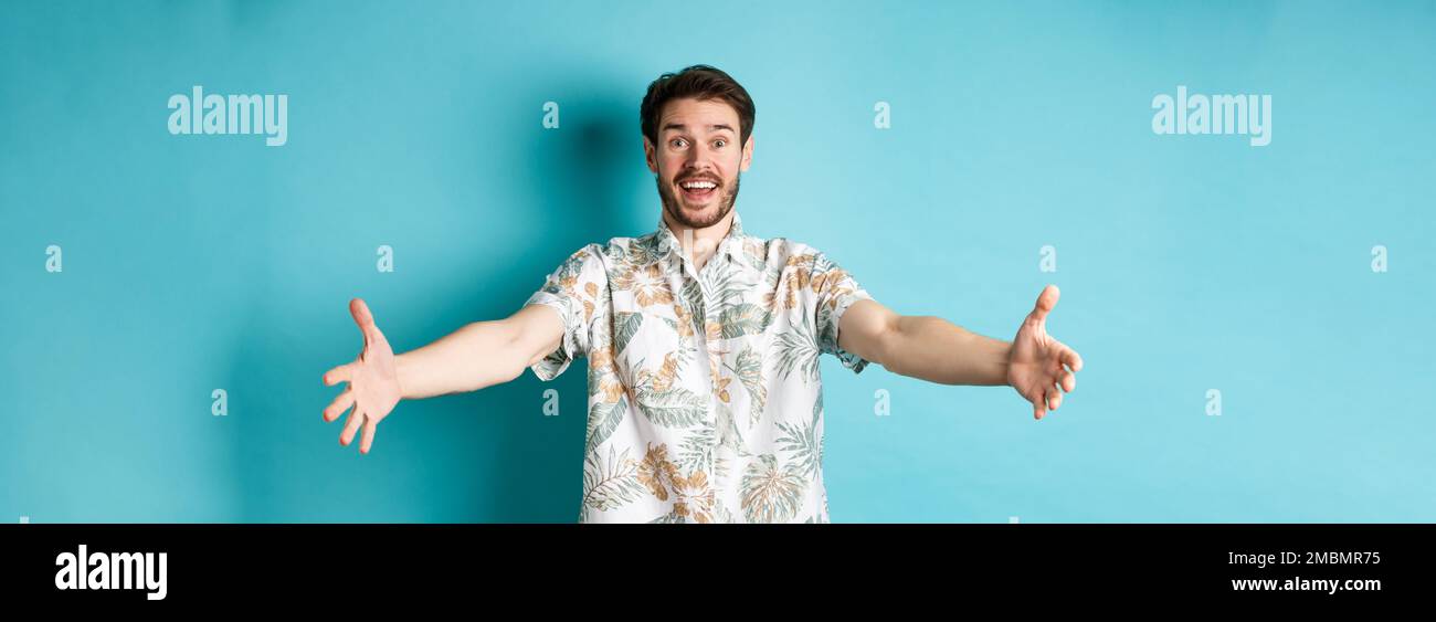 Summer holiday. Cheerful tourist stretch out hands for hug, welcome ...