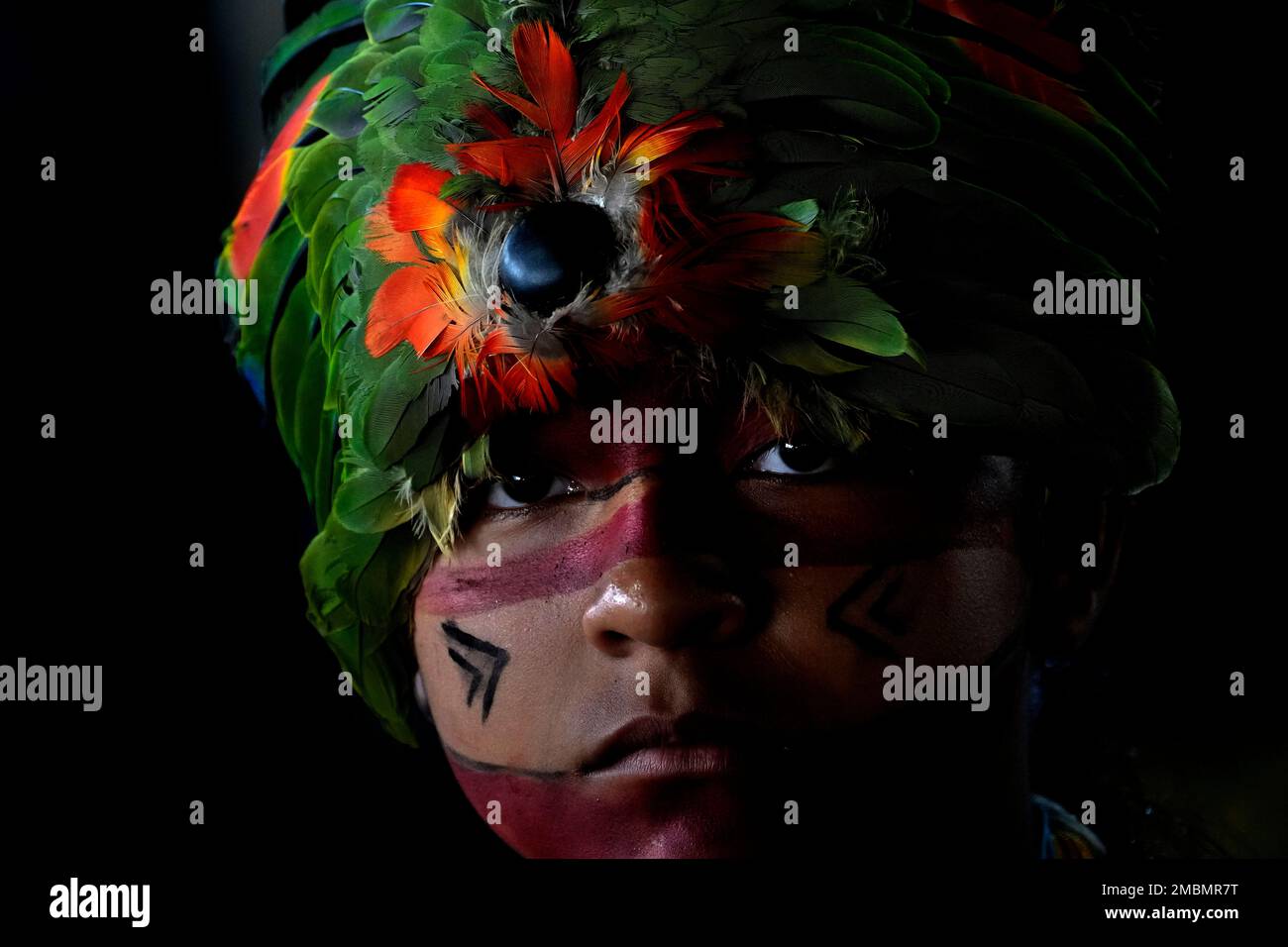 A Pataxo Indigenous girl attends a ceremony called the Meeting of the ...