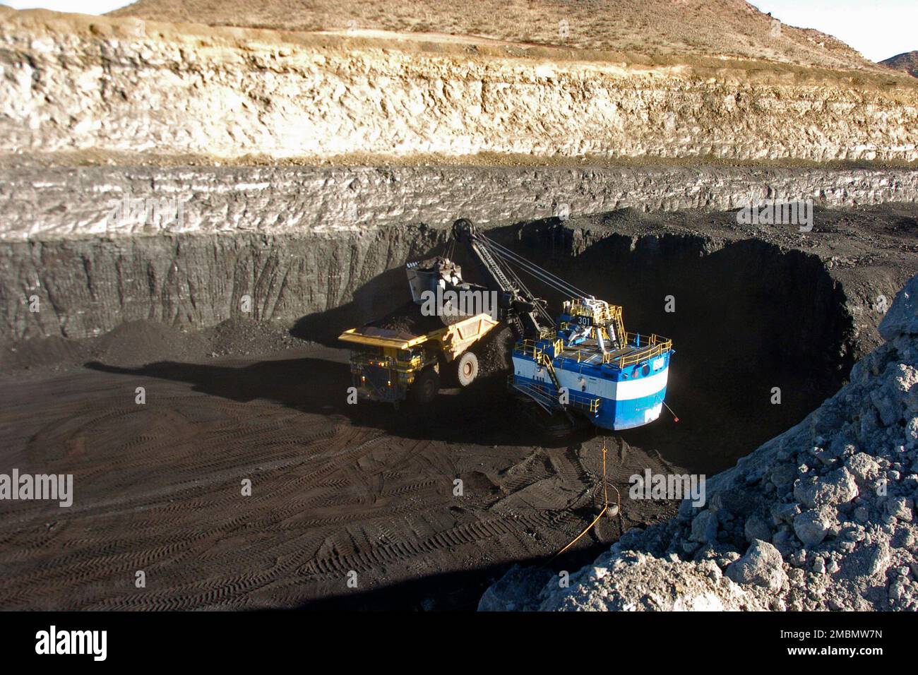 FILE - In this Nov. 15, 2016 photo, a mechanized shovel loads coal from ...