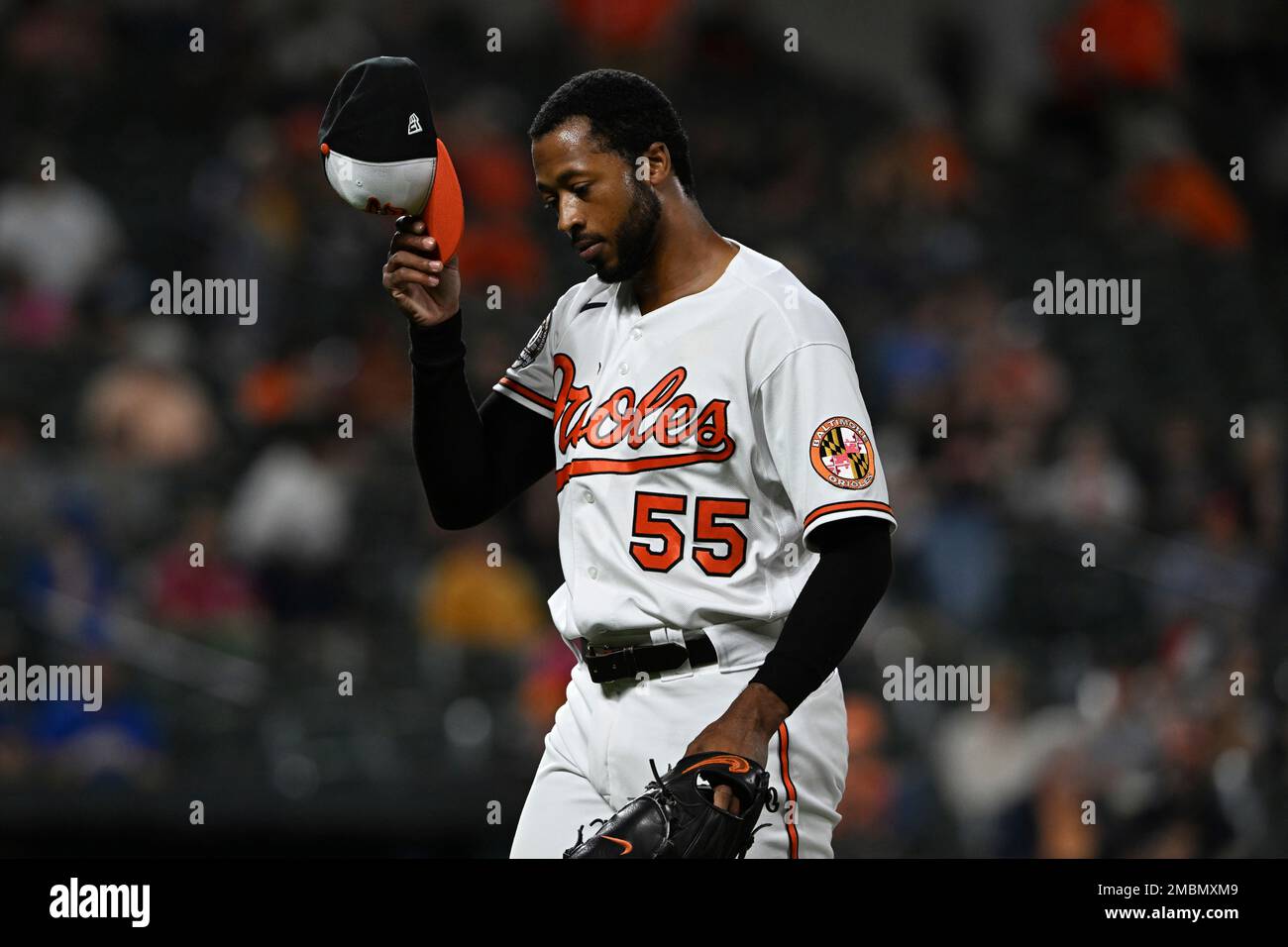 Baltimore Orioles pitcher Dillon Tate reacts after retiring the side in ...