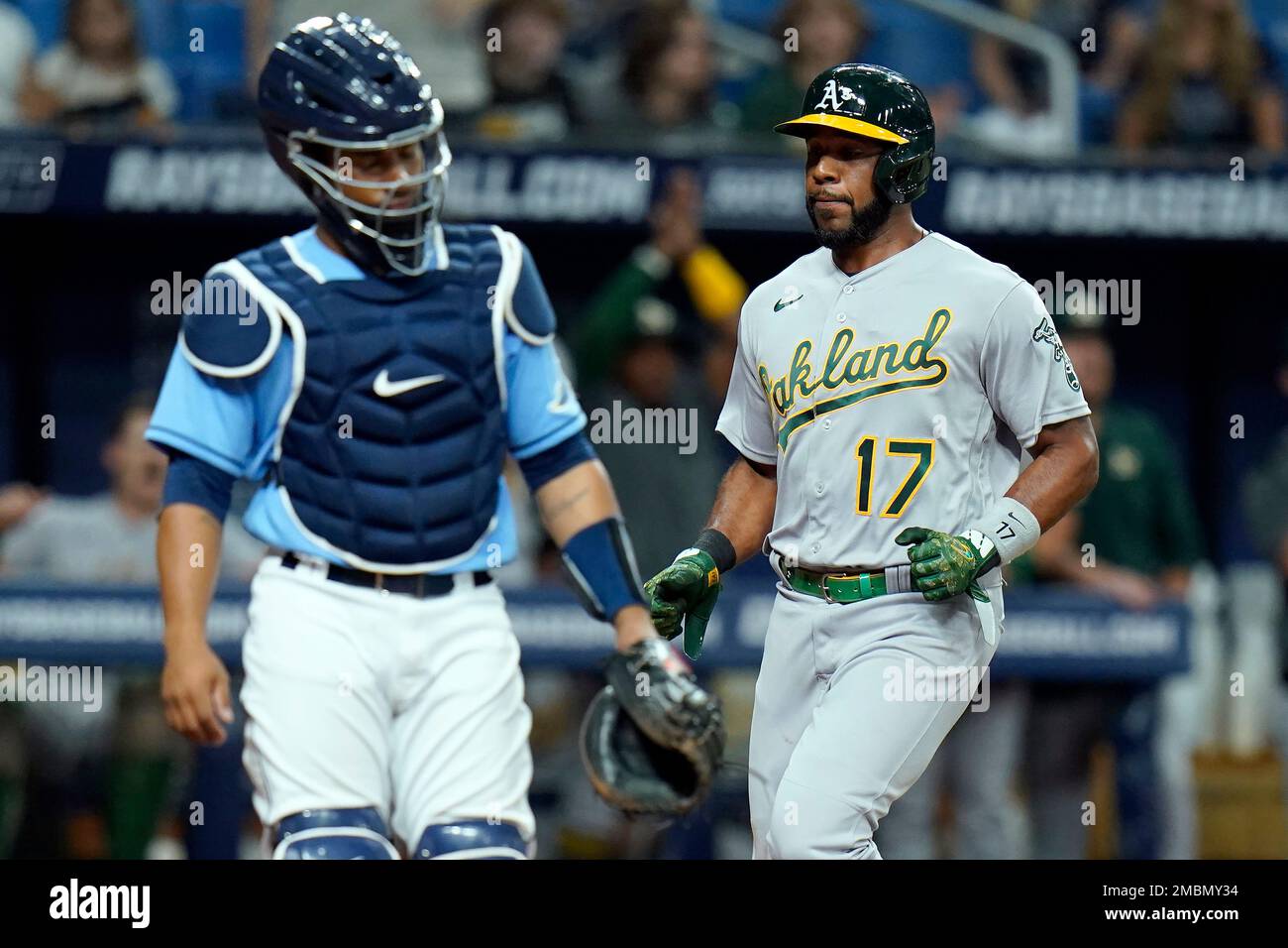 Oakland Athletics' Elvis Andrus (17) scores behind Tampa Bay Rays ...