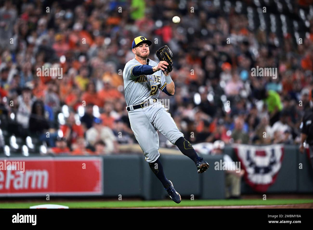Milwaukee Brewers third baseman Mike Brousseau throws to first to put ...